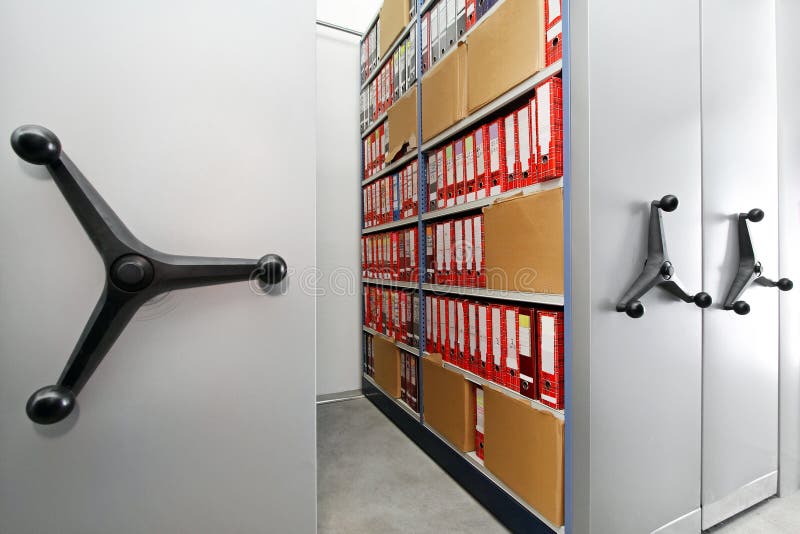 Rolling shelves archive stock image. Image of file, warehouse - 26575587