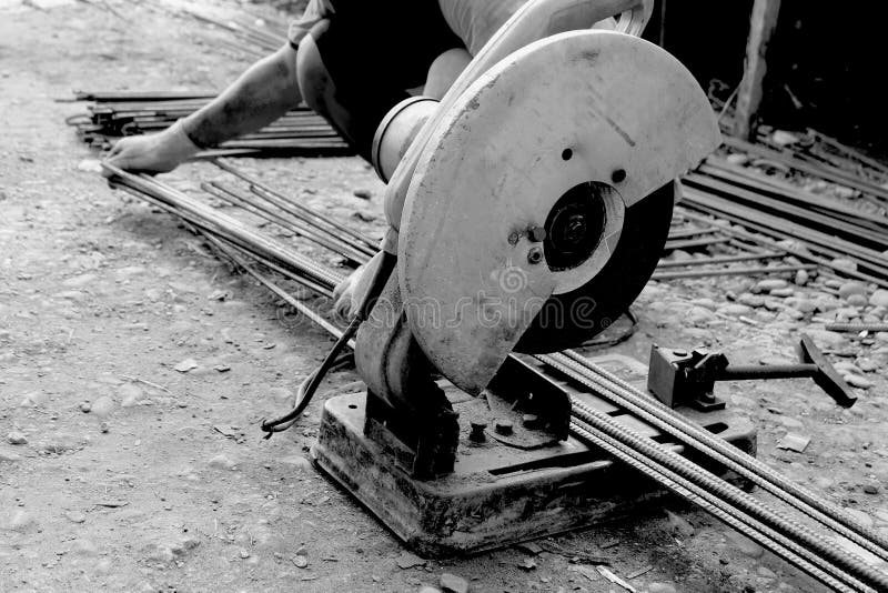 Round Bar in a Construction Site Cutter Machine with a Round Bar in a ...