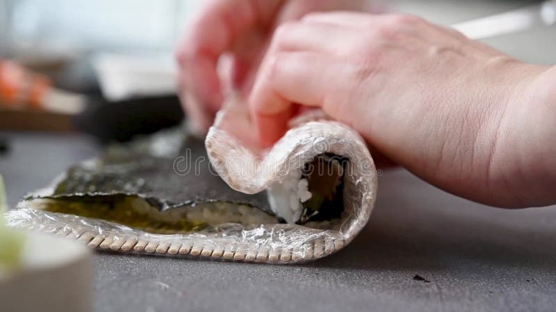 Rolling Sushi, Cooking Process. Rice, Fish Fillets, Cream Cheese ...
