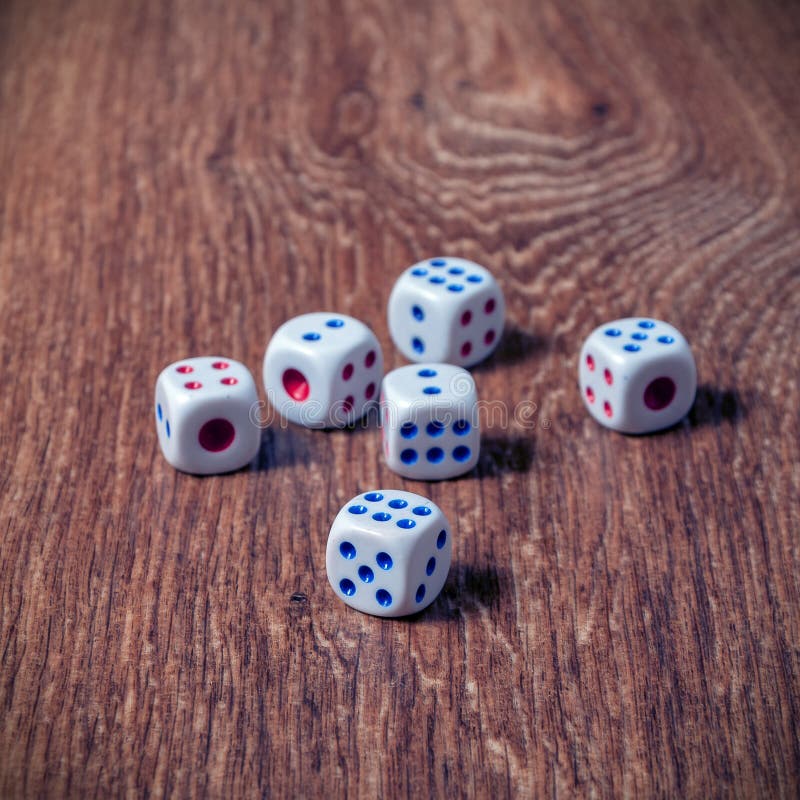 Rolling Three Dice on a Wooden Desk Stock Photo - Image of colors ...