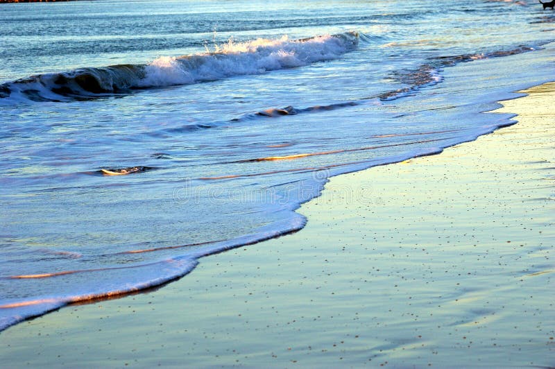 Small Rolling Waves During A Sunny Day At The Beach Stock Image - Image ...