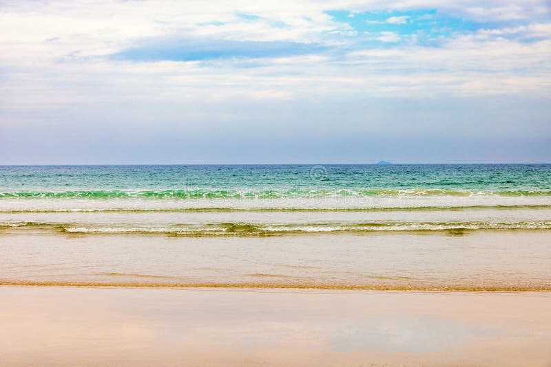 Rolling Waves at a Sandy Beach with a View To the Horizon Stock Image - Image of rolling, waves ...