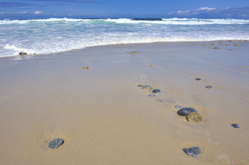 Rolling Waves Stones Rocks on Empty Beach Stock Photo - Image of ...