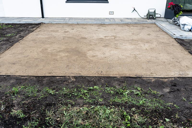 Rolling Yellow Sand with a Steel Roller for a Garden Pool, Empty Square ...