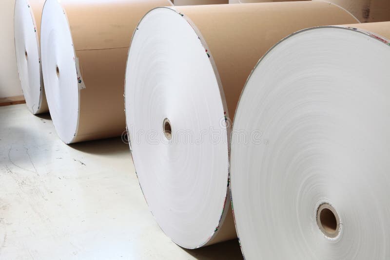 White Rolls of Printing Paper on a Loading Dock Stock Photo - Image of ...