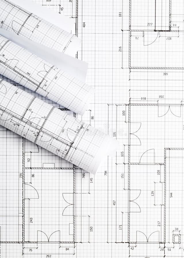Rolls Of Architectural Blueprint House Building Plans With Pencil And ...