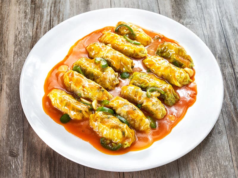 Rolls of Beef Wrapped with Cabbage on White Dish Stock Image - Image of ...