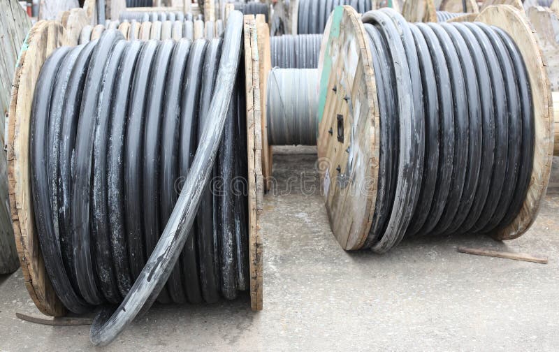 Rolls of black cables stock photo. Image of electricity - 44975022