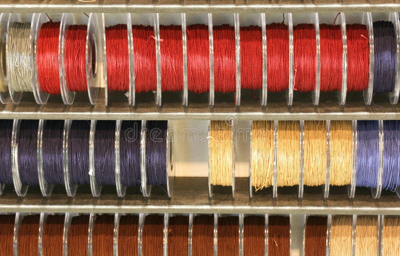 Rolls of Colored Threads on Display in a Tailor Shop Stock Photo ...