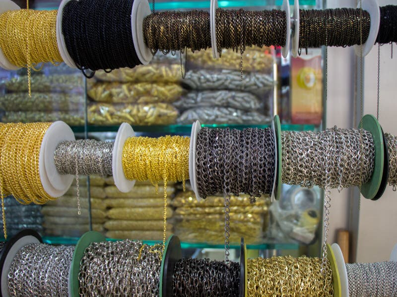 Rolls of decorative chains stock image. Image of abstract - 94986711