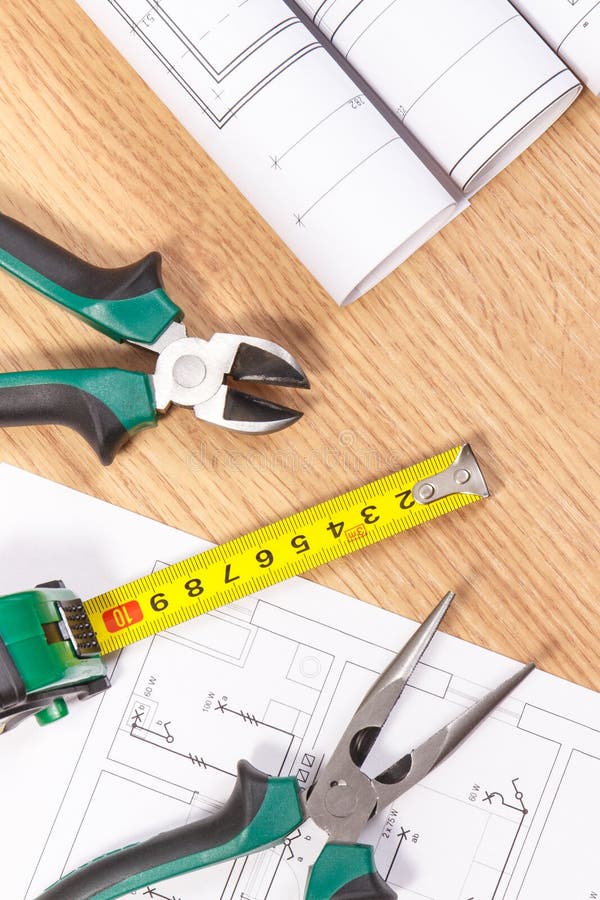 Rolls of Electrical Drawings or Diagrams and Work Tools for Engineer ...