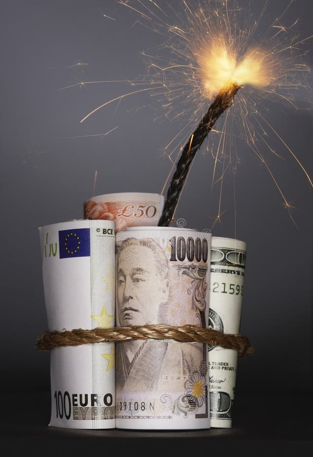 Rolls of Money Symbolizing Dynamite with Lit Fuse in Studio Stock Photo ...