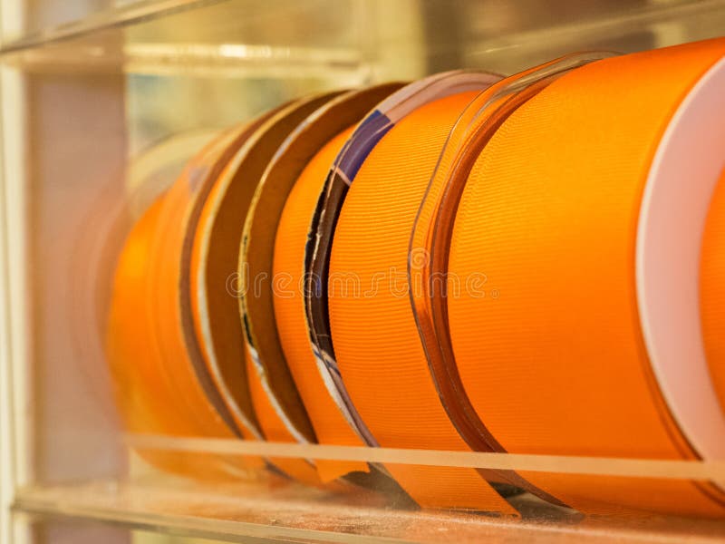 Rolls of Orange ribbon stock image. Image of ribbon, trim - 83672289