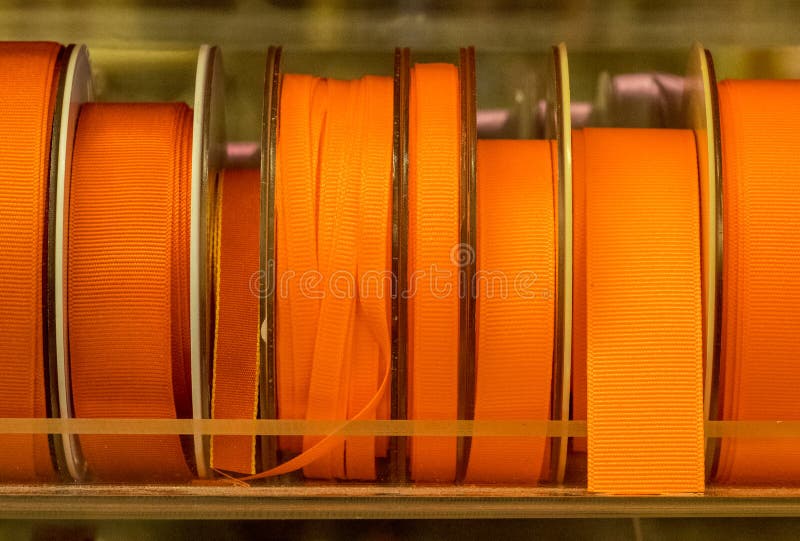 Rolls of Orange ribbon stock photo. Image of sewing, varnish - 83672830