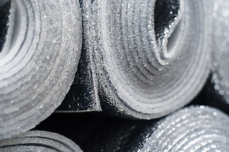 Rolls of Polyethylene Foam and Foil Insulation Material. Close-up Stock ...