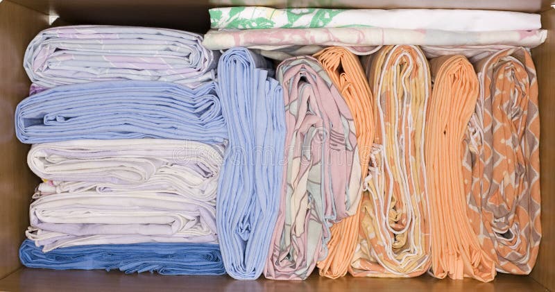 Rolls of Sheets on Wardrobe Closet Shelf Stock Photo - Image of living ...