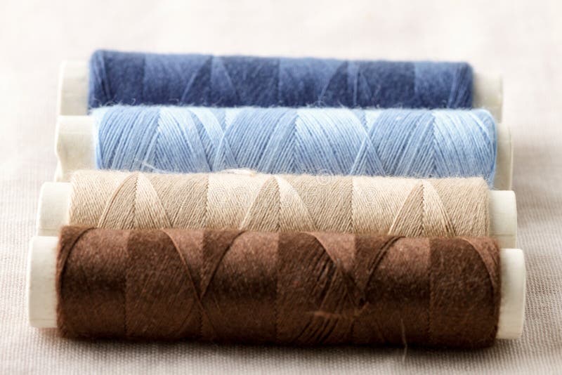 Rolls of thread stock photo. Image of blue, close, reel - 67025920
