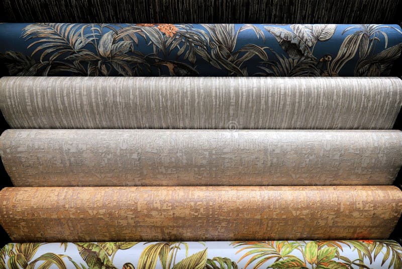 Rolls of Vinyl Wallpaper in Building Materials Store. Various Textures ...