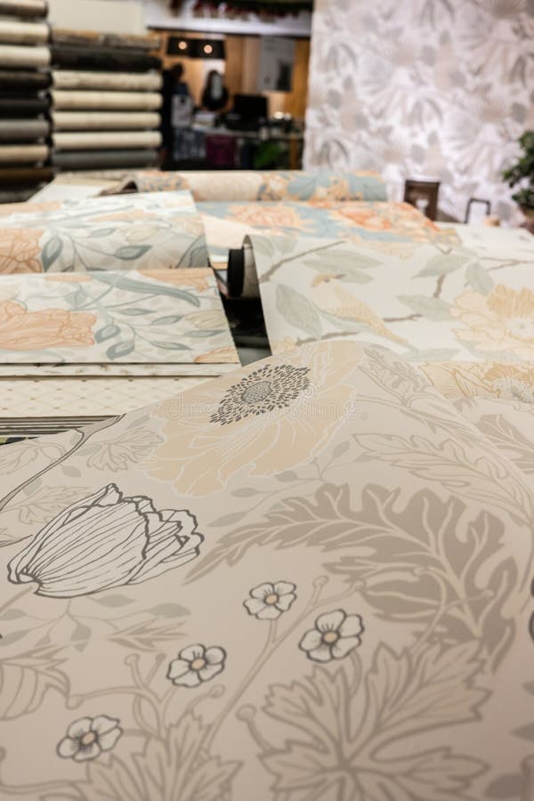 Rolls of Wallpaper on a Table.. Stock Photo - Image of abstract ...