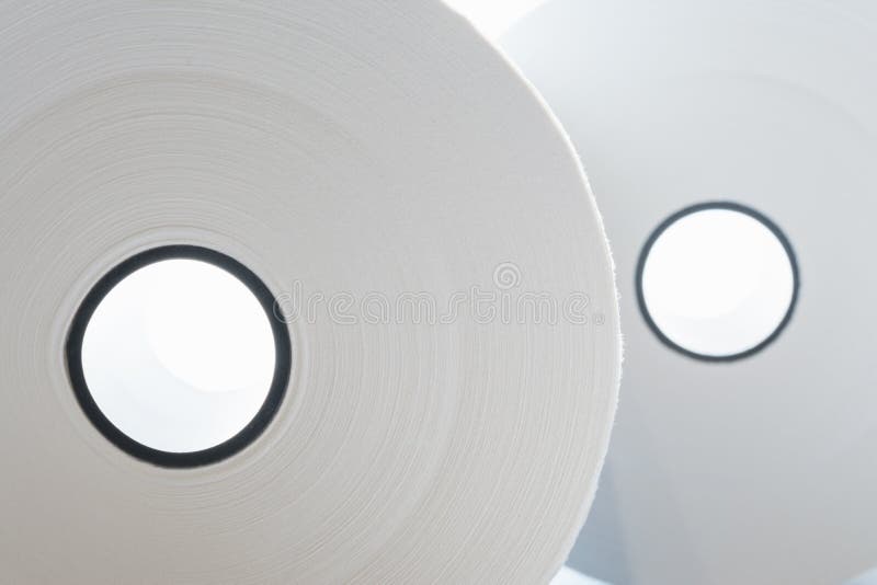 Rolls of White Paper with Black Coils on White Background Stock Image ...