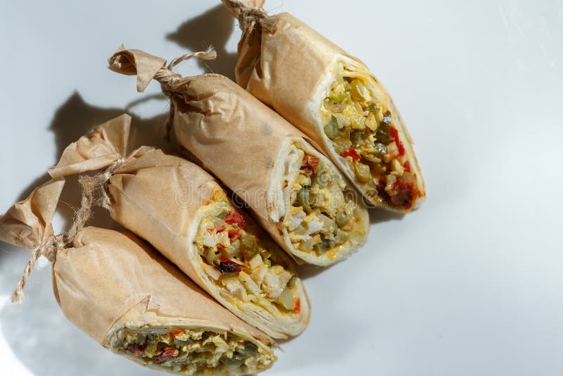 Rolls wrapped in paper stock photo. Image of production - 168973898