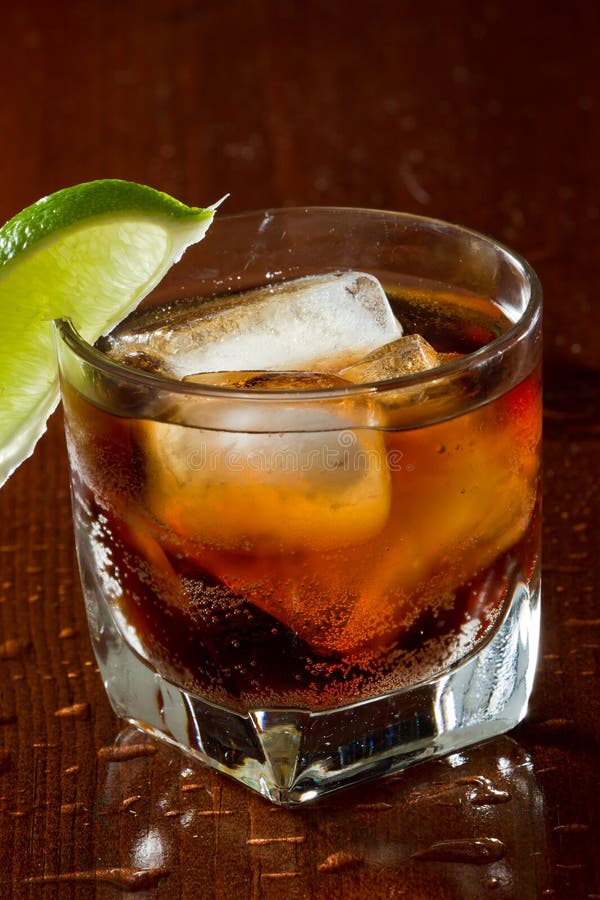 Summer Cooling Alcoholic Beverage from Cola, Whiskey, Lime and Liqueur ...