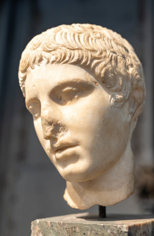 Close-up on Head of Ancient Roman Marble Statue in Ruins Portraiting a ...