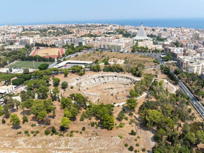 Roman Amphitheater of Syracuse Stock Photo - Image of forest, tree ...