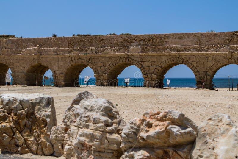 The Roman Aqueduct in Caesarea Israel Stock Image - Image of ...