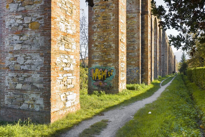 Roman aqueduct stock photo. Image of aqueduct, outdoors - 65617848 Roman aqueduct stock photo. Image of aqueduct, outdoors - 65617848