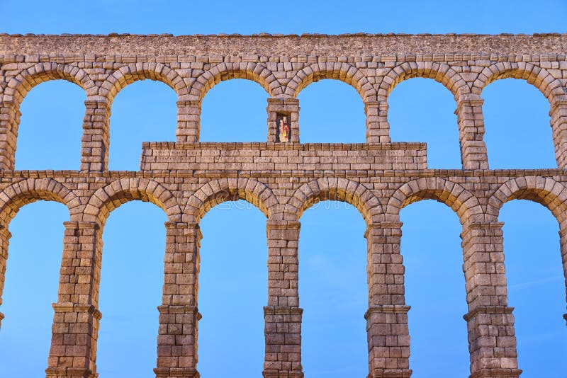 Roman Aqueduct in Segovia at Sunset. Ancient Engineering Work. Spain ...