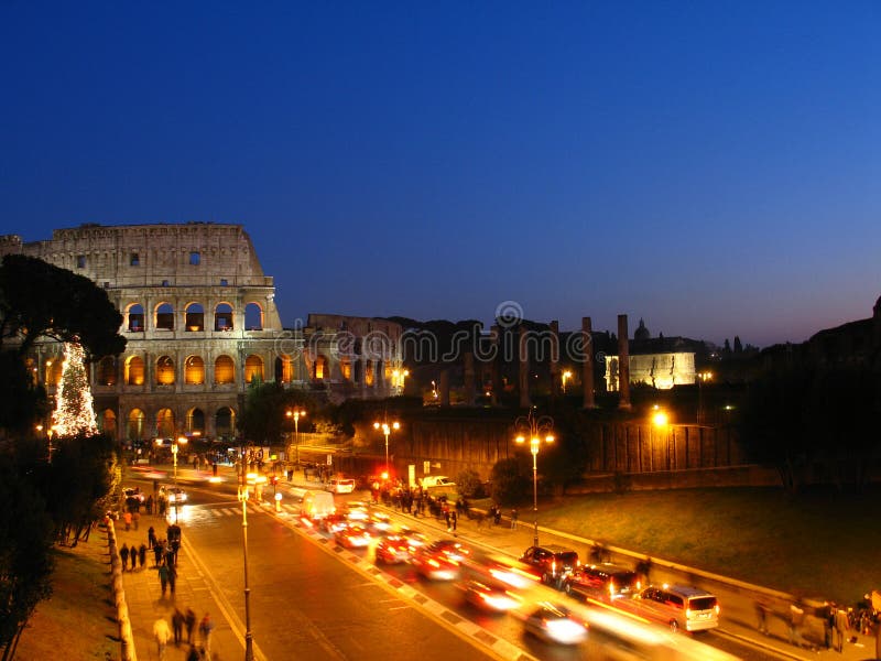 Roman Colosseum at night stock photo. Image of detail - 6595620
