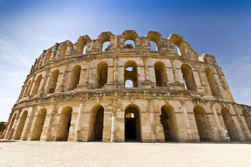 Roman Colosseum in Tunisia stock photo. Image of archway - 16791874