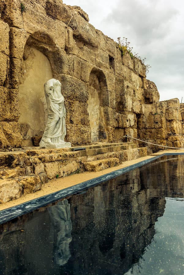 Roman Emperor Statue Reflecting in a Pool in Caesarea Stock Image ...