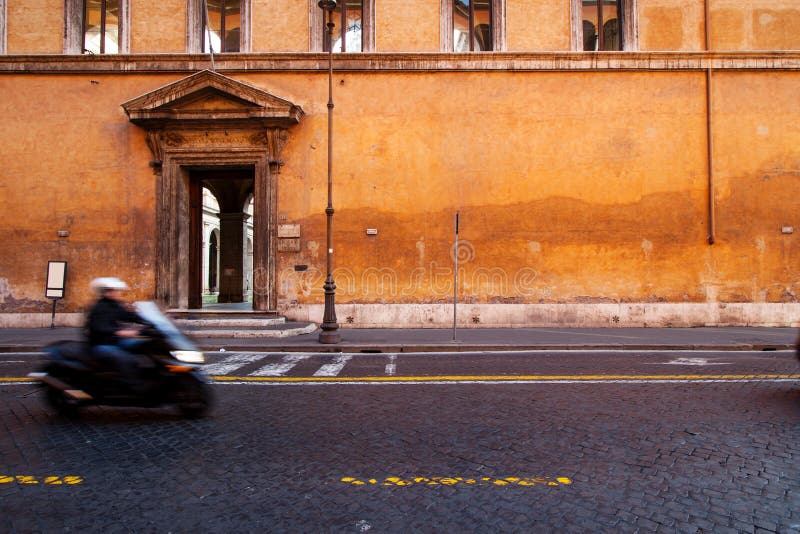 Roman Scooter with Motion Blur Stock Photo - Image of cobblestone ...