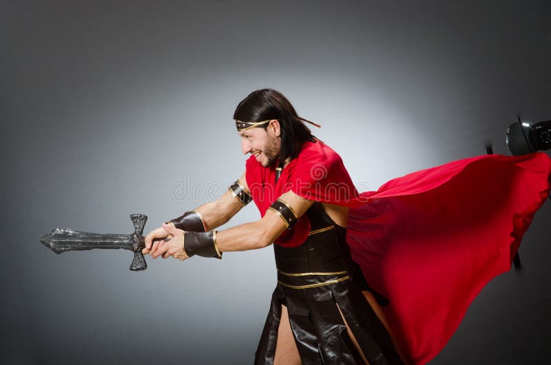 The Roman Warrior With Sword Against Background Stock Photo - Image of ...
