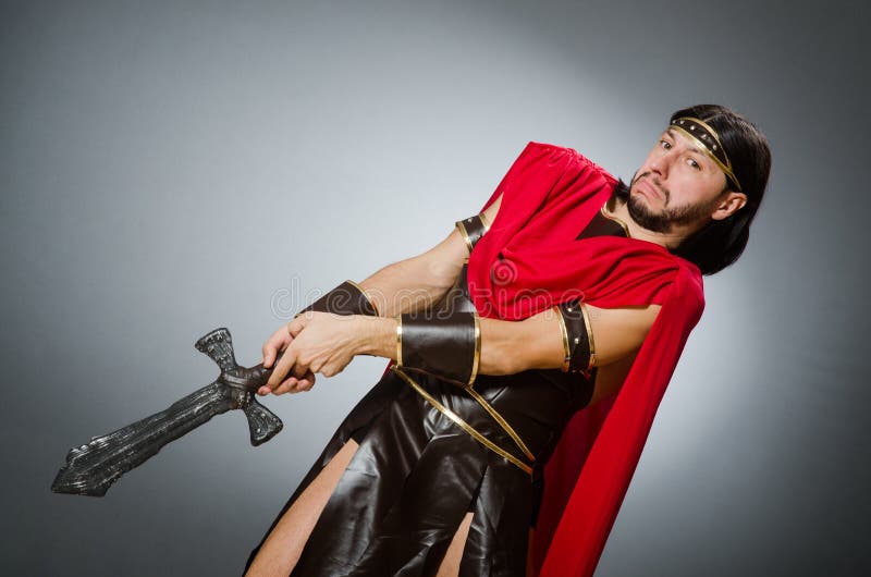 The Roman Warrior with Sword Against Background Stock Image - Image of ...
