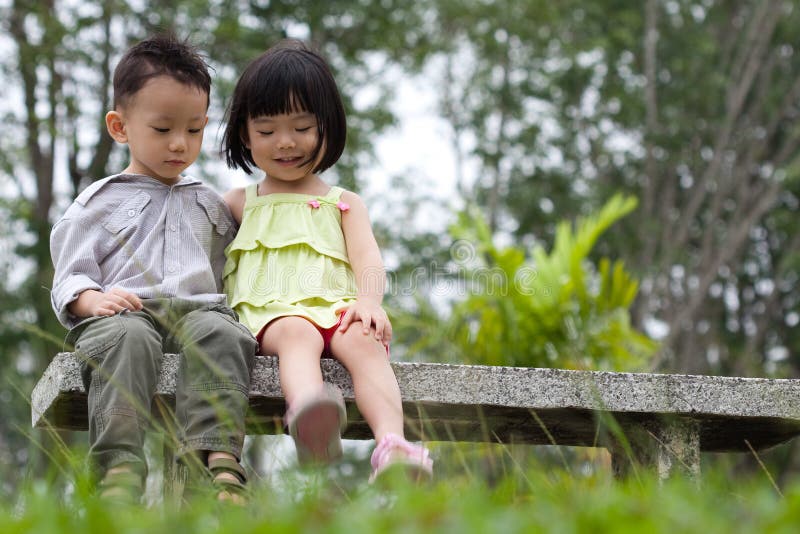 Two Little Kids Dating in a Park Stock Photo - Image of chinese ...
