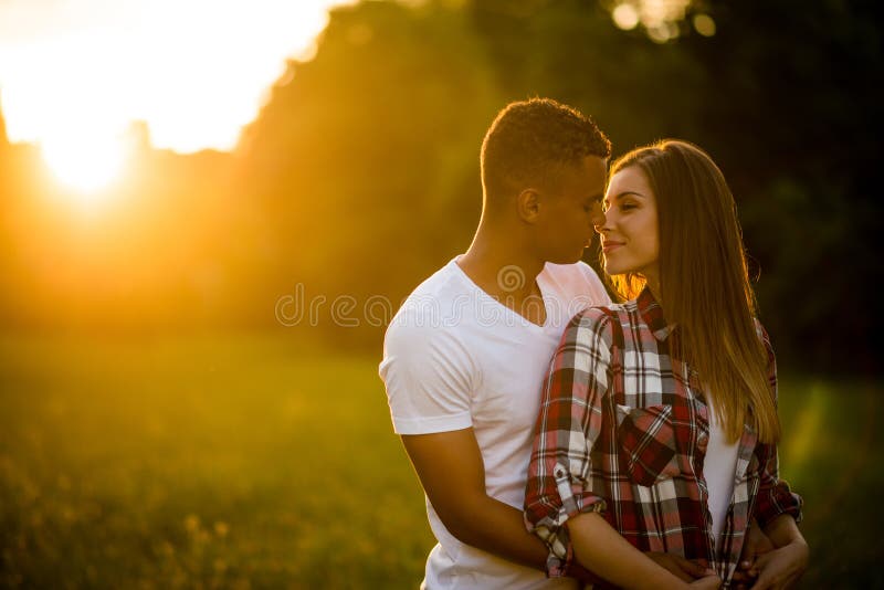 Romance in Nature - Young Couple on Date Stock Photo - Image of casual ...