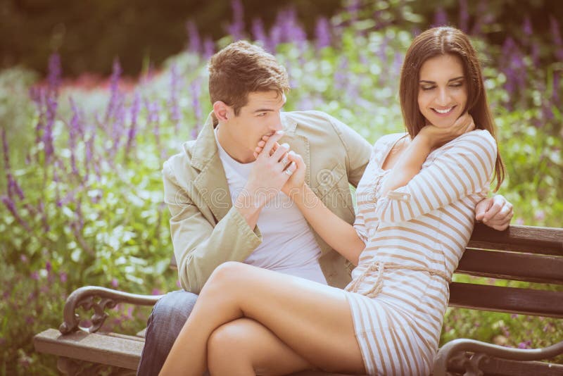Romance in the Park stock photo. Image of happiness, flirting - 55374690