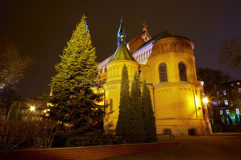 Romanesque Brick Catholic Church at Night Stock Photo - Image of cross ...