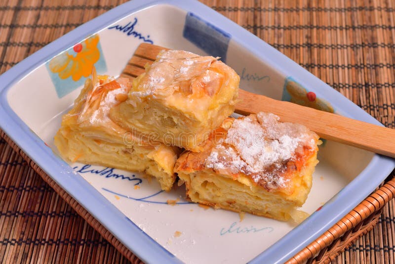Romanian Cheese Pie with Wood Spoon in a Plate Stock Image - Image of ...