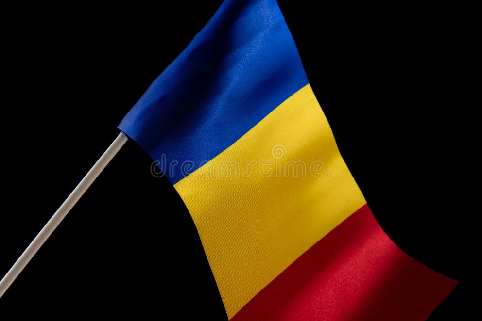 The Romanian Flag on a Black Background Developing in the Wind Stock ...