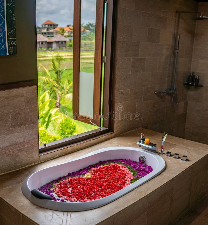 Romantic Bath with Flowers stock photo. Image of oriental - 165994146