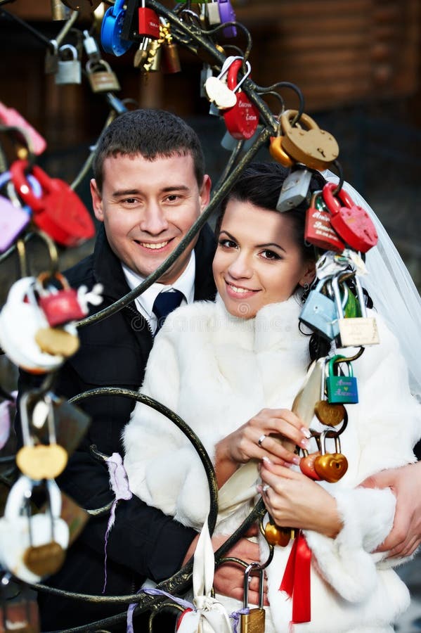 Romantic Bride and Groom about Locks of Lovers Stock Photo - Image of ...
