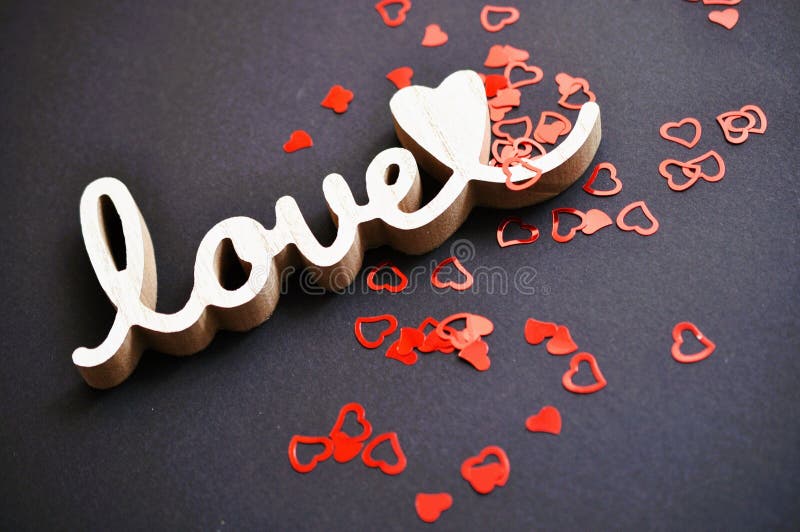 Love Write on Black Background with Hearts Stock Illustration ...