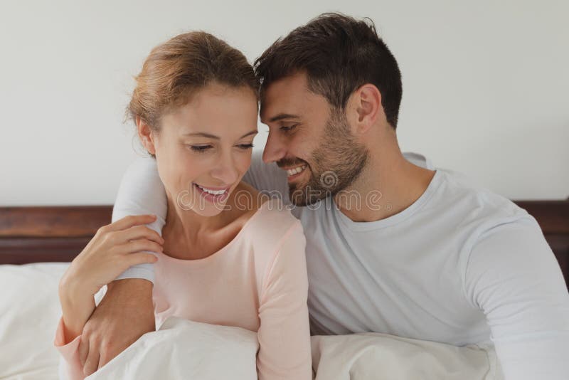 Romantic Couple in Bed in Bedroom Stock Photo - Image of handsome ...