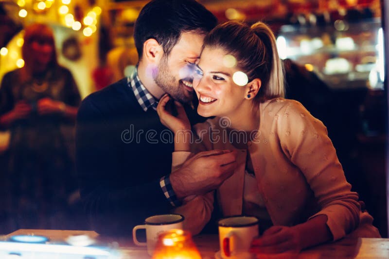 Romantic Couple Dating in Pub at Night Stock Image - Image of ...