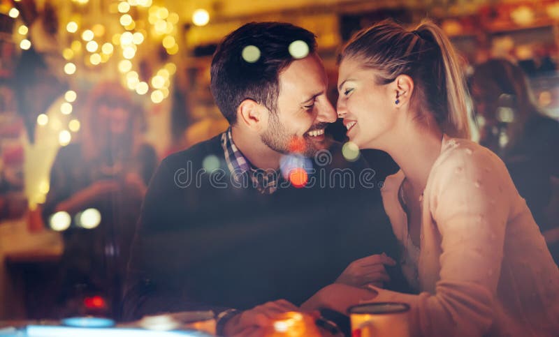 Romantic Couple Dating in Pub at Night Stock Image - Image of female ...