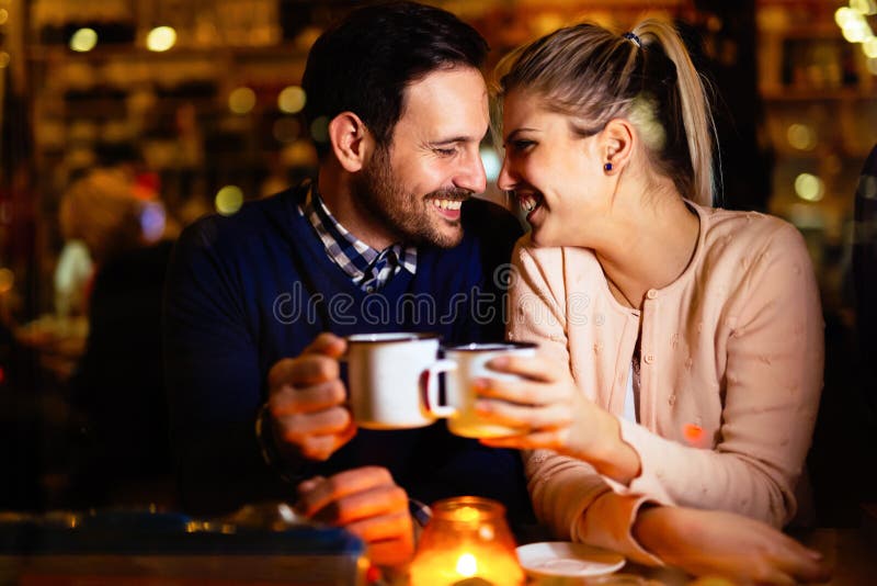 Romantic Couple Dating in Pub at Night Stock Photo - Image of drink ...